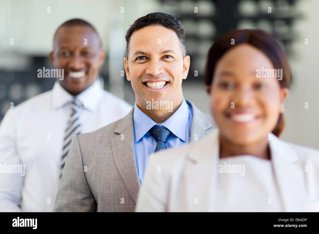 group of happy business executives standing in a row Stock Photo - Alamy