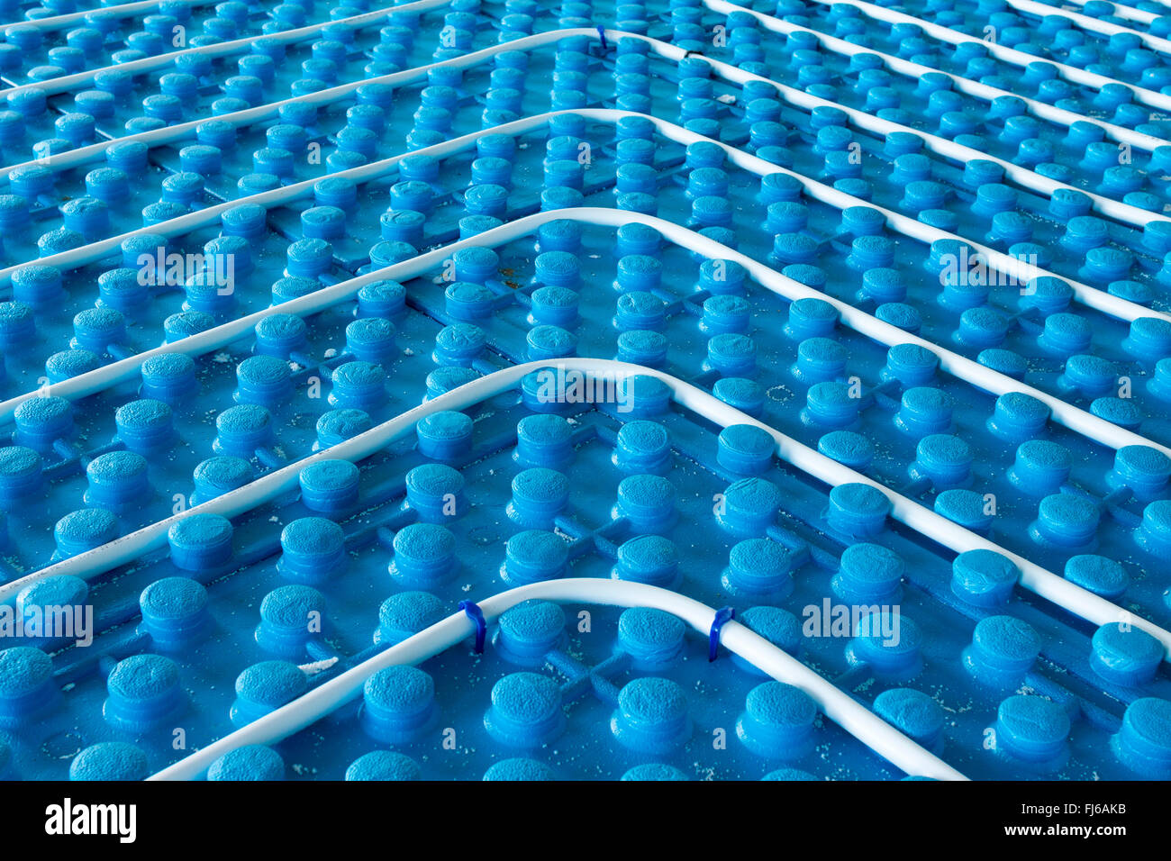 System floor radiant with polyethylene pipes Stock Photo - Alamy