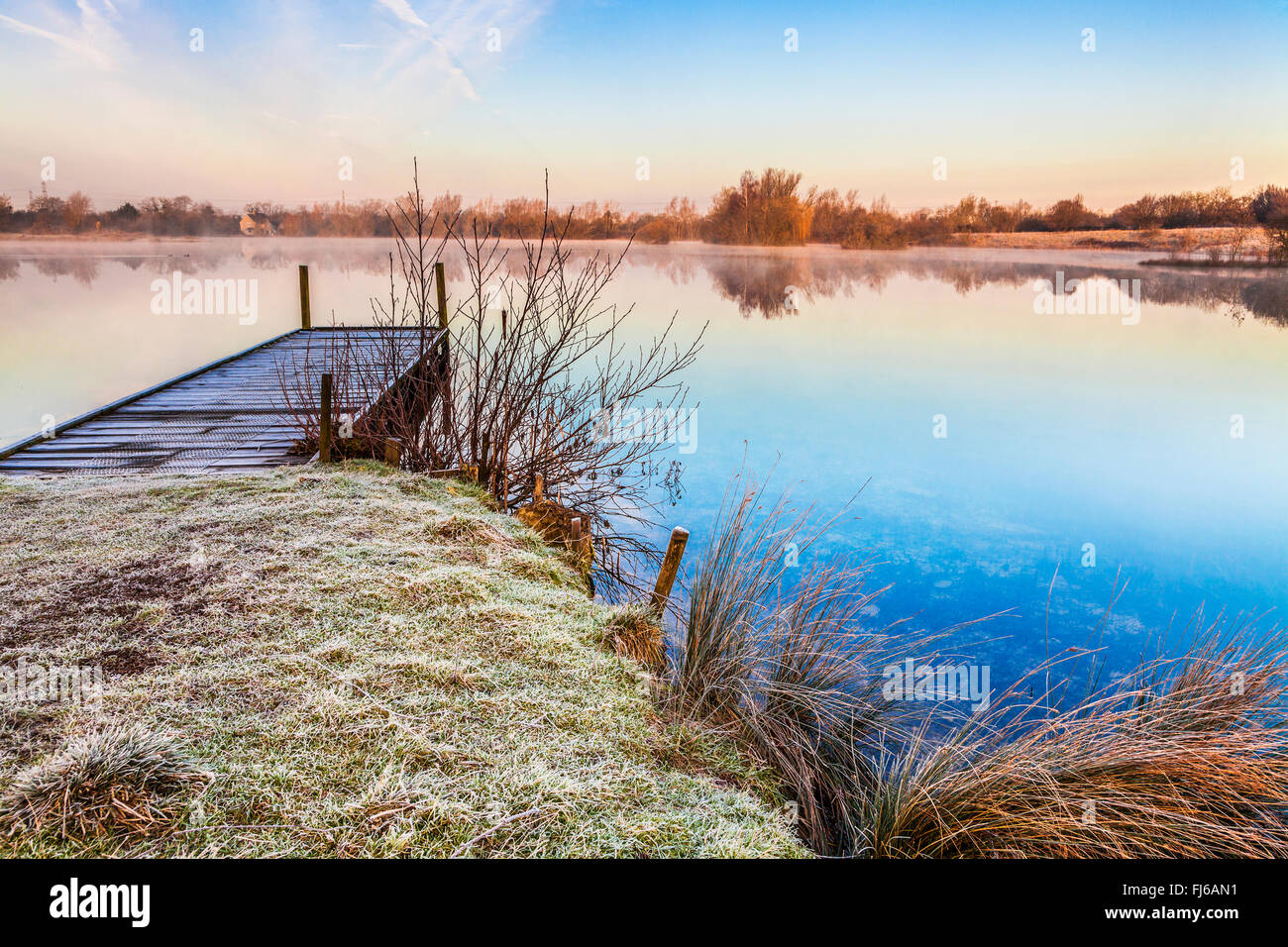 A frosty winter morning on one of the lakes at Cotswold Water Park ...