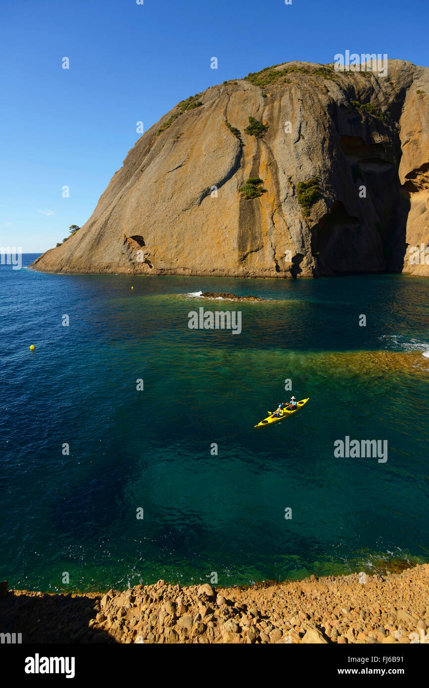 Sea kayaking near coastal rock Les Trois Secs, France, Provence ...