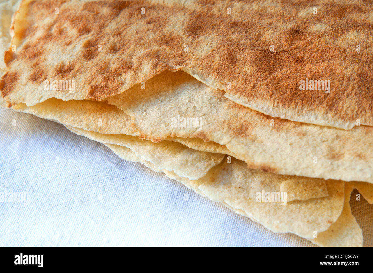 Cagliari,Sardinia, Italy, 04/2015.Homemade "Carasau" bread in slices ...