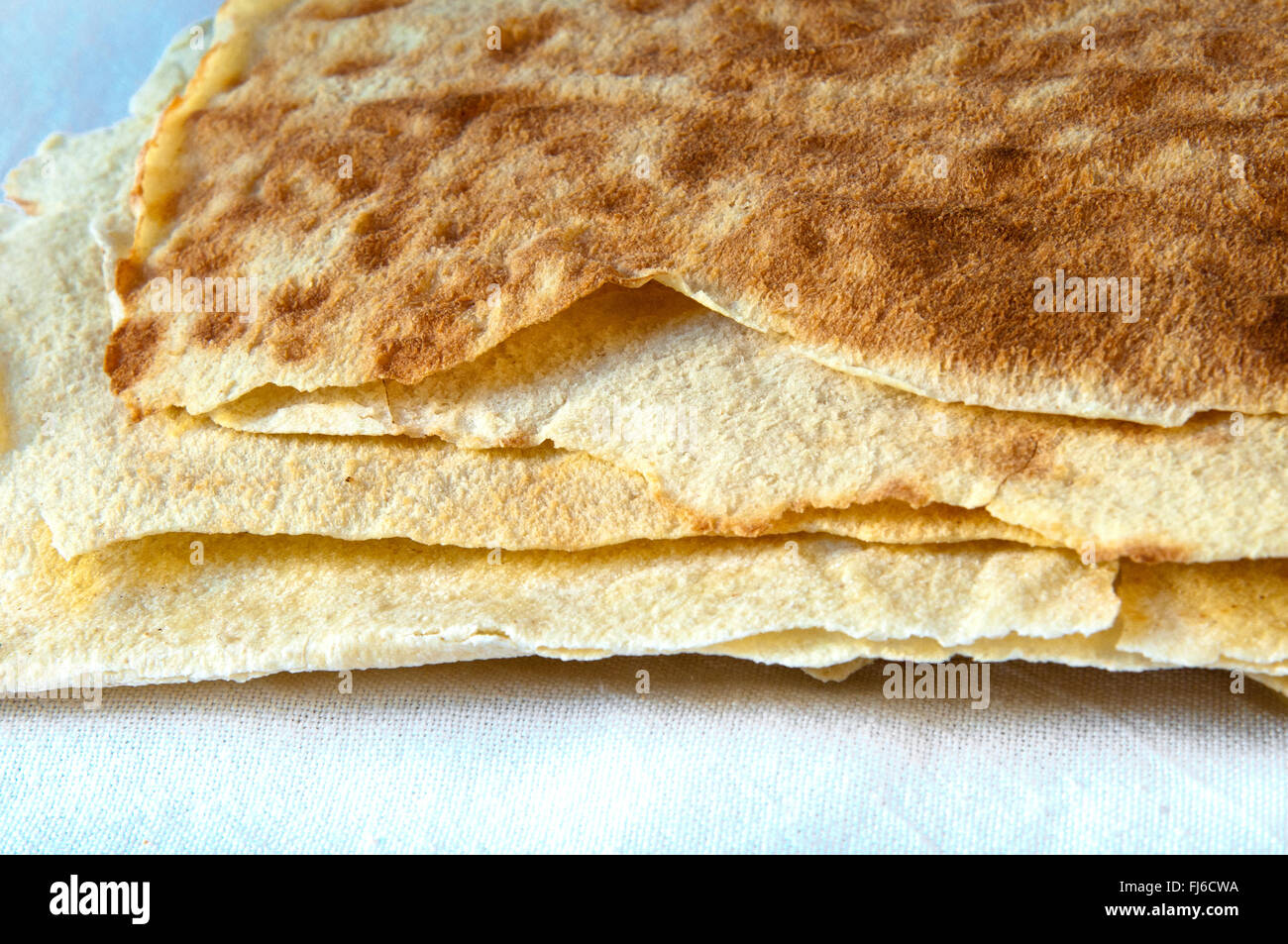 Cagliari,Sardinia, Italy, 04/2015.Homemade "Carasau" bread in slices ...