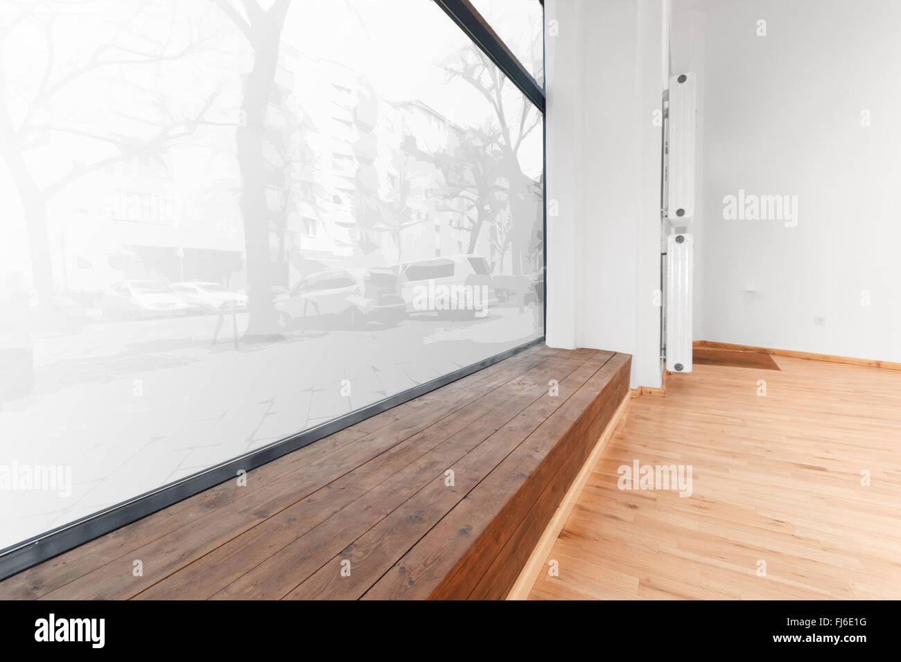 renovated room with shopping window - empty store / shop with wooden ...