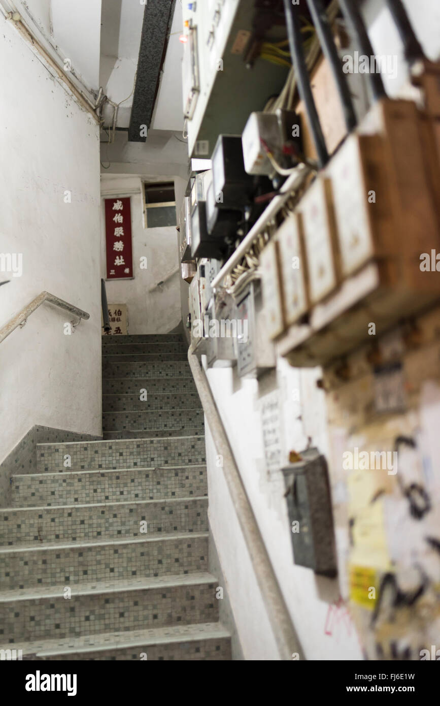 HONG KONG, CHINA - 24 FEB 2016: Stair of Tong Lau, tenement buildings ...
