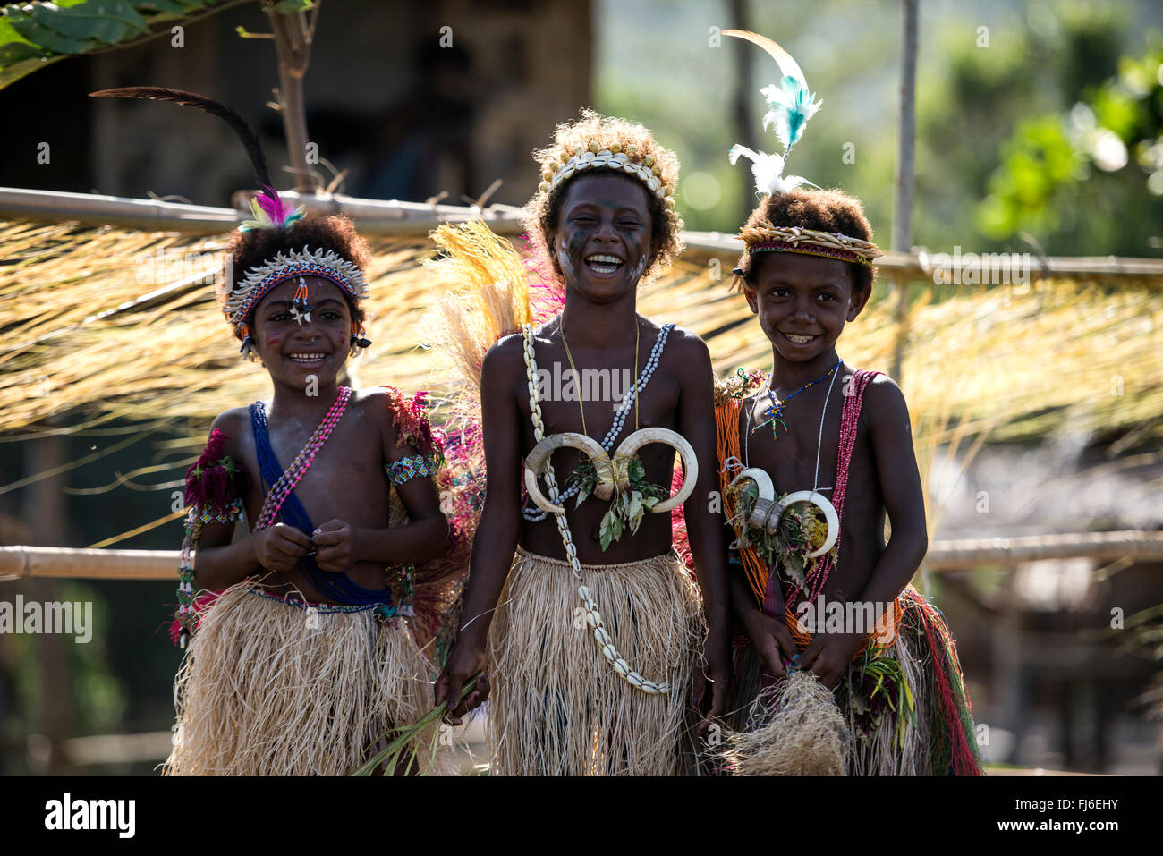 Young girls wearing traditional costume Tolokiwa, Papua New Guinea ...