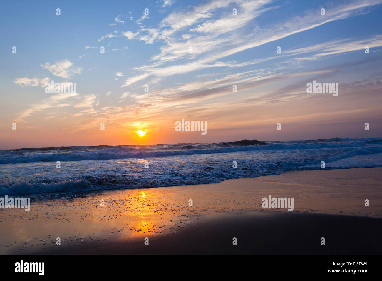 Beach ocean horizon sunrise colors the shoreline landscape Stock Photo ...