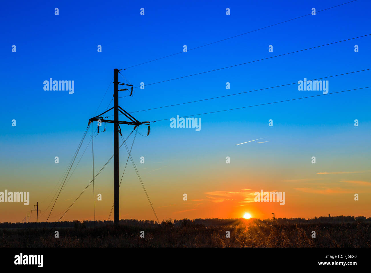 power line at sunset Stock Photo - Alamy