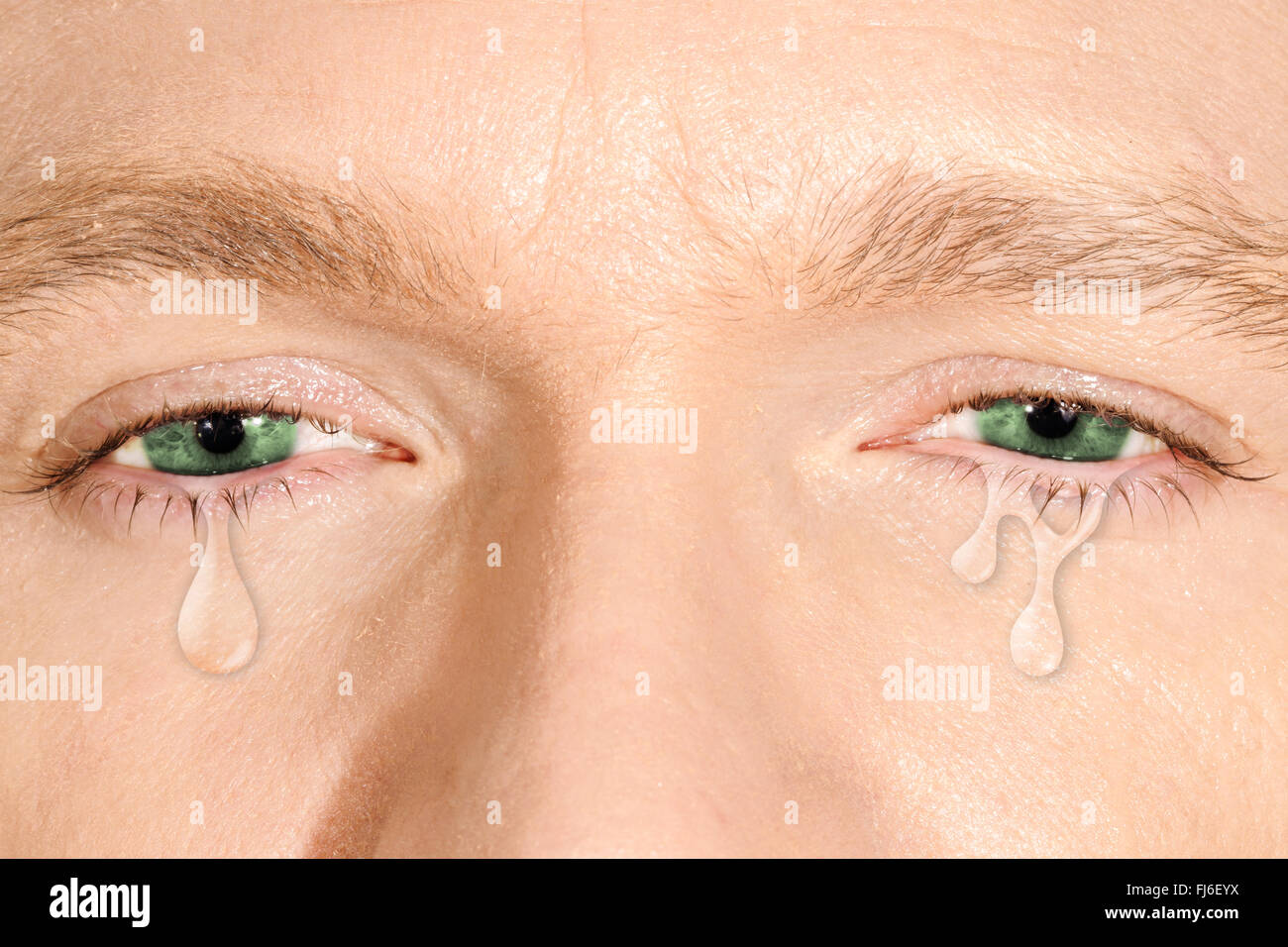 Crying green eyes Stock Photo - Alamy