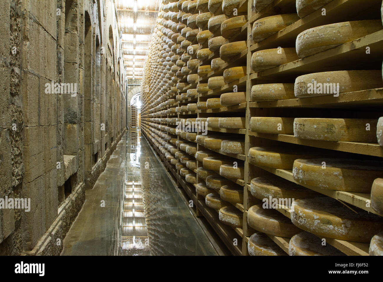 Cheese wheels comte hi-res stock photography and images - Alamy
