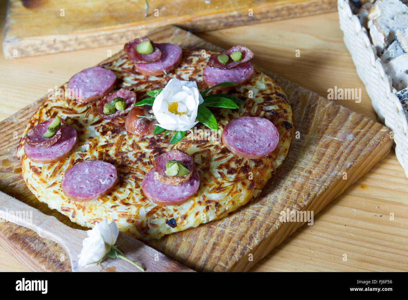 Rosti and sausages special mountain dish Stock Photo - Alamy