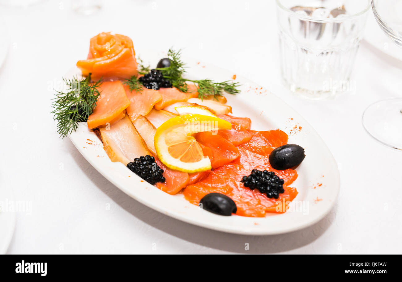 Assorted fish on a plate Stock Photo - Alamy