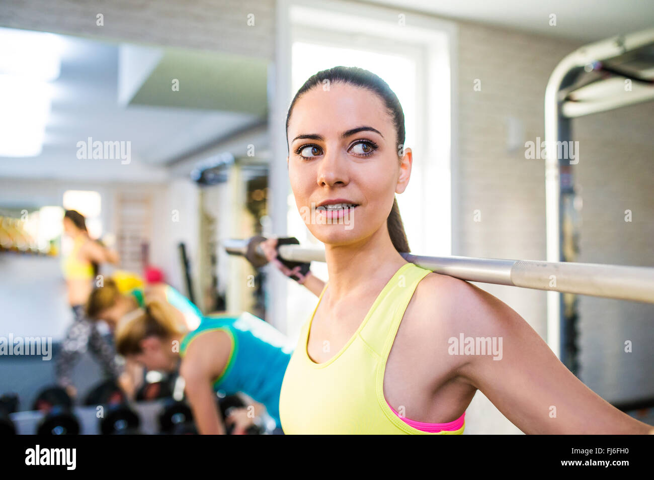 Attractive fit woman in gym hi-res stock photography and images - Alamy