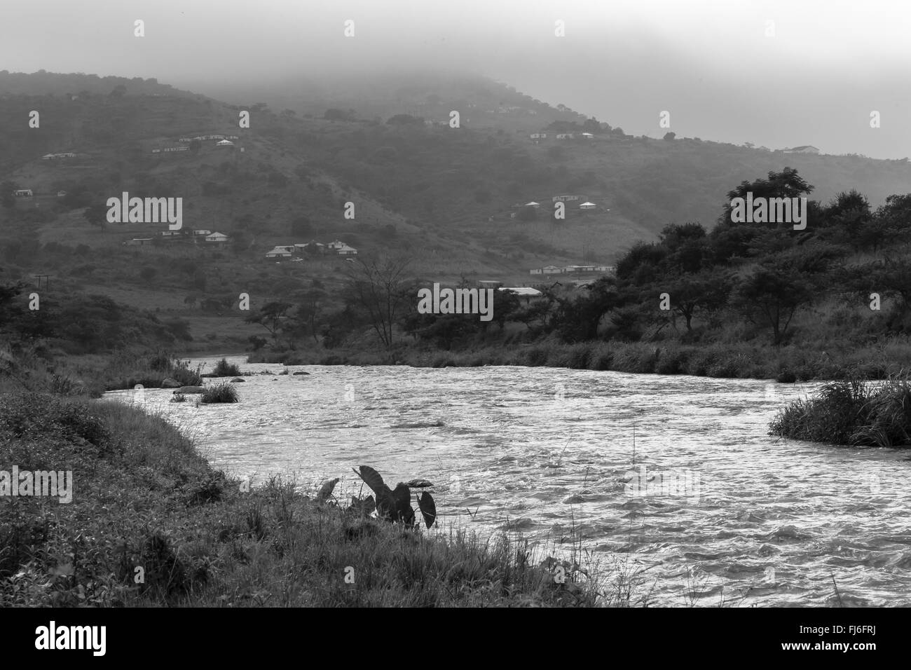 River rapids fast flowing rain water through hazy morning valley ... River rapids fast flowing rain water through hazy morning valley ...