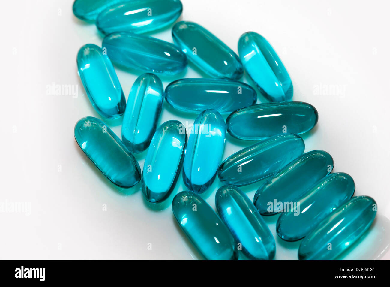 Blue capsules hi-res stock photography and images - Alamy