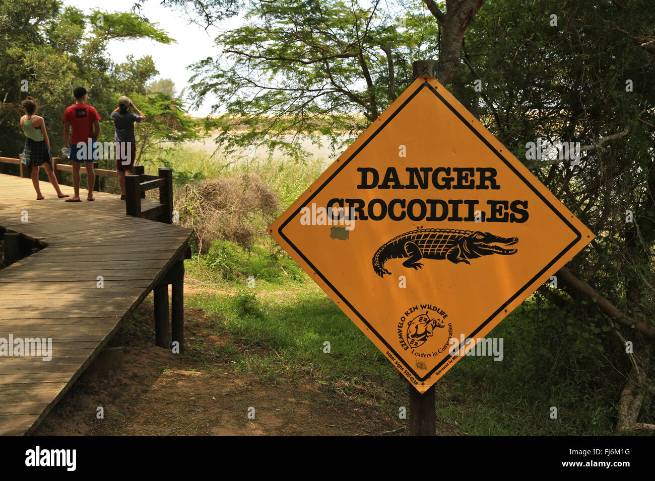 Danger Sign Warning Of Crocodiles Stock Photos & Danger Sign Warning Of ...