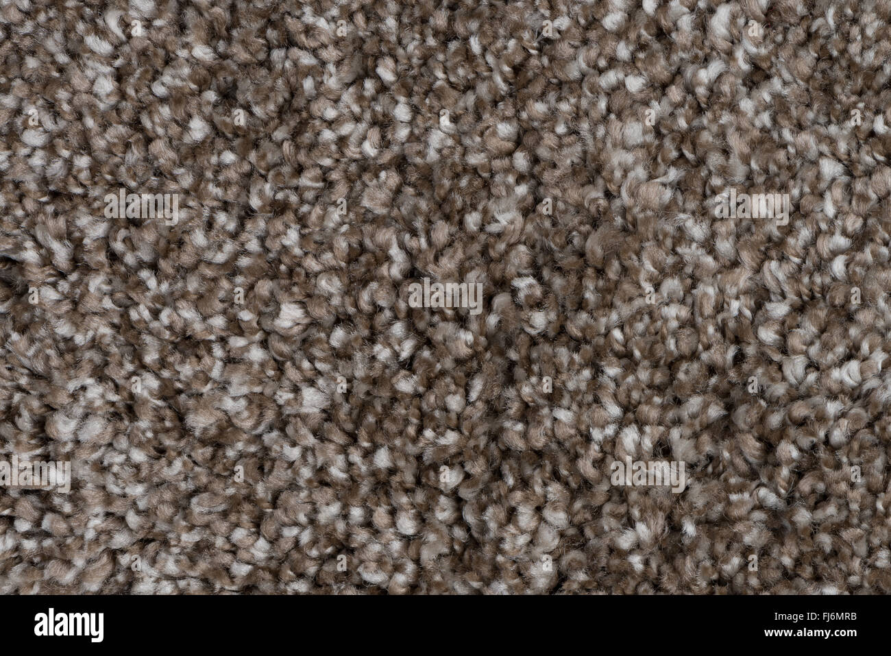 Closeup detail of brown carpet texture background Stock Photo - Alamy