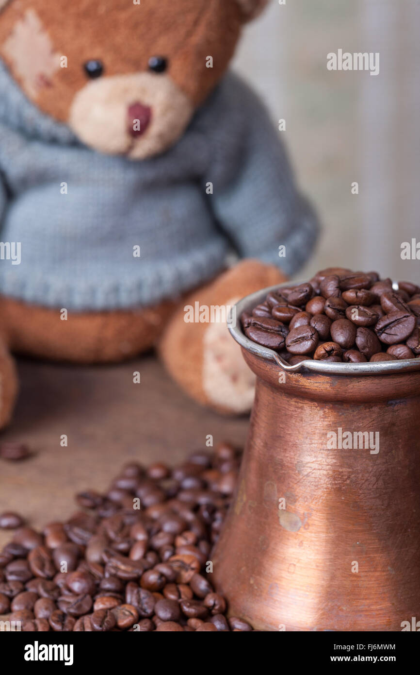 Teddy bear and coffee vintage toned picture with white background Stock ...