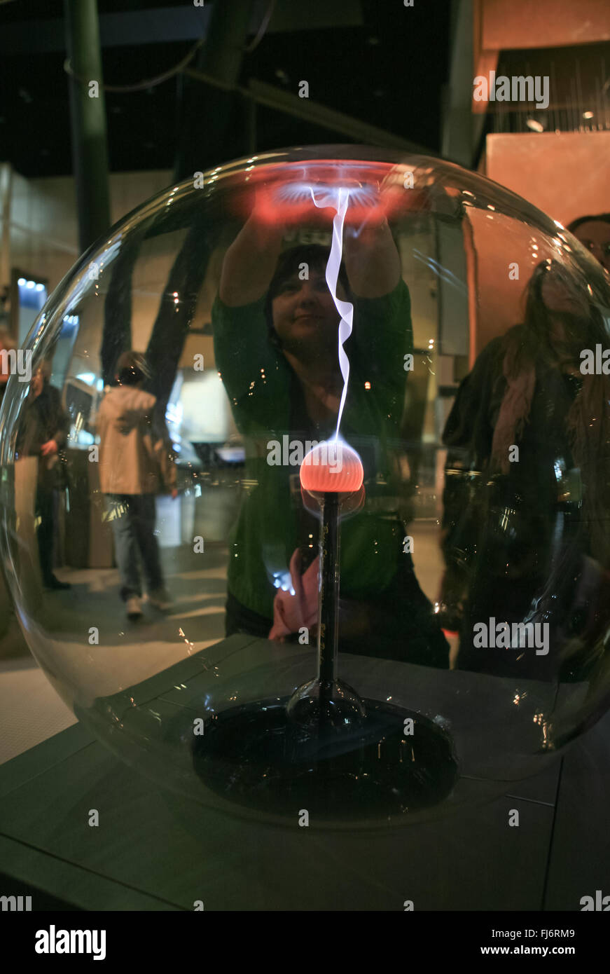 BARCELONA, SPAIN - APRIL 3: Woman testing the energy sphere at ...