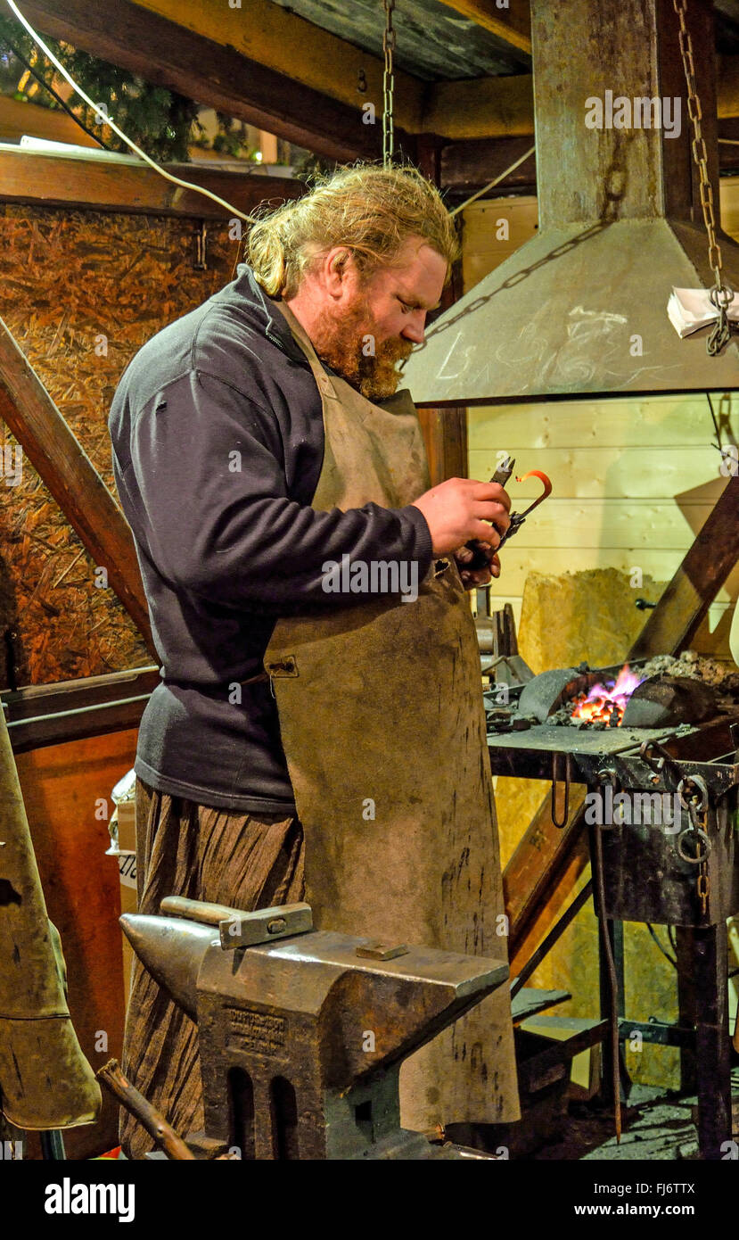 Blacksmith at work Stock Photo - Alamy