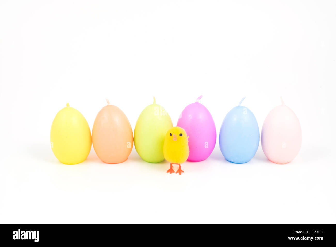 Easter, small chick and colored eggs Stock Photo - Alamy