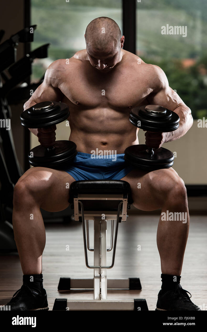 Young Man With Muscular Body Preparing Himself For Work Out In Gym ...