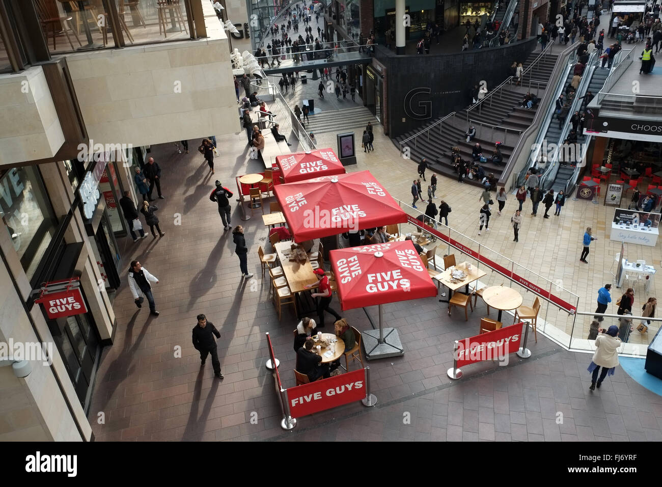 Five guys outdoor seating and chain,England, eating area inside the ...