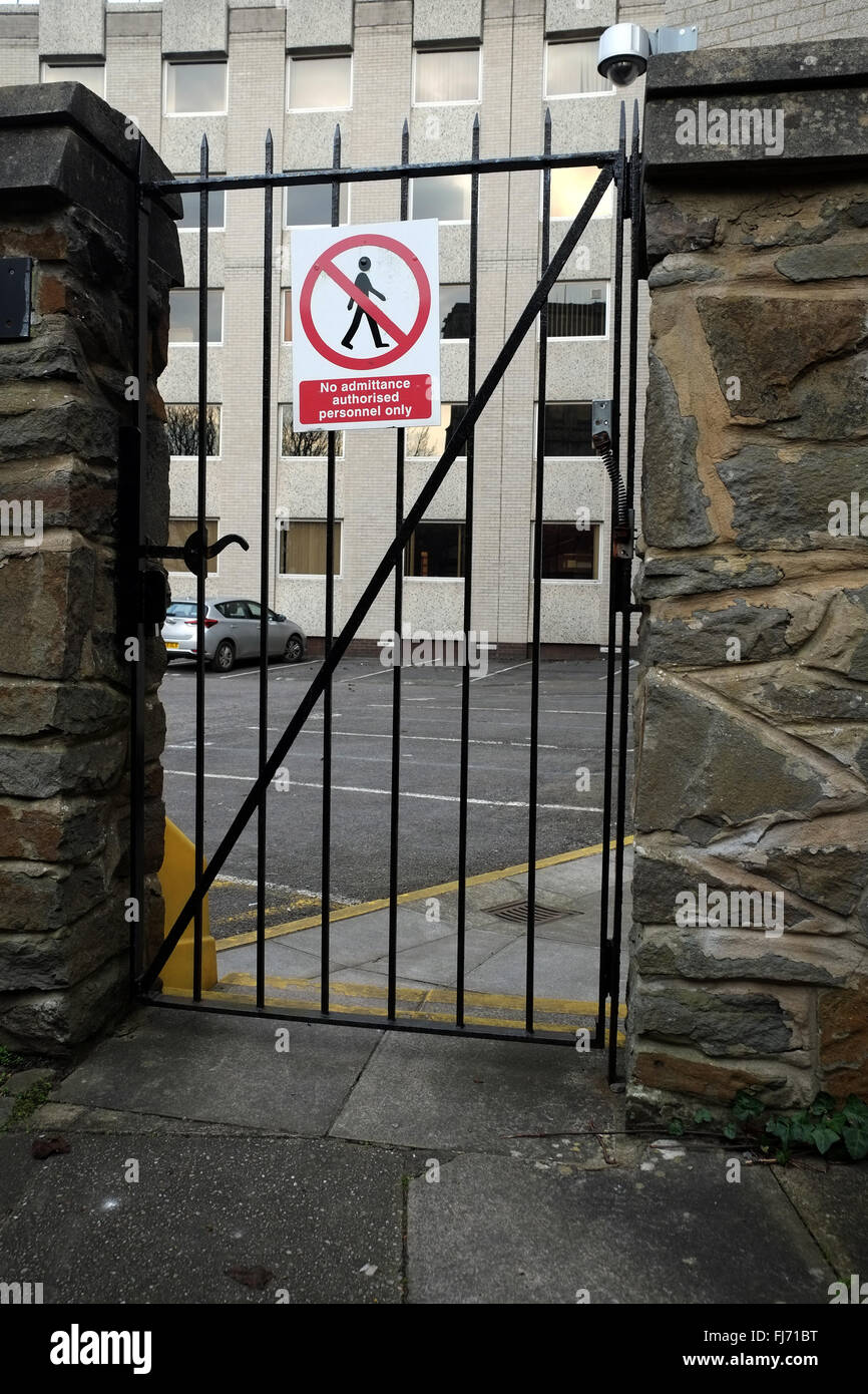 Metal security gate with a watching cctv camera for an office ...
