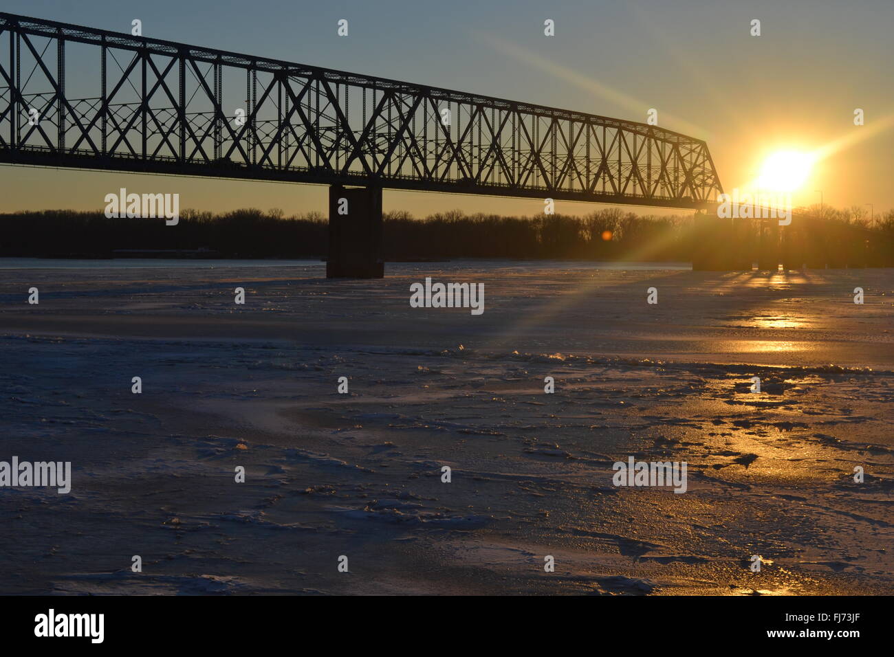 Memorial Bridge in Quincy, Illinois during a winter sunset Stock Photo ...