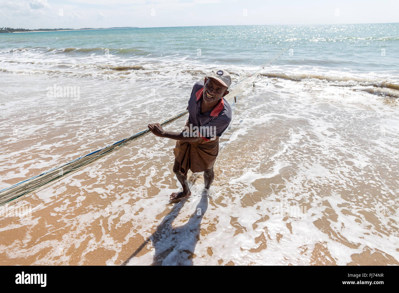 Fishermen pulling large nets hi-res stock photography and images - Alamy