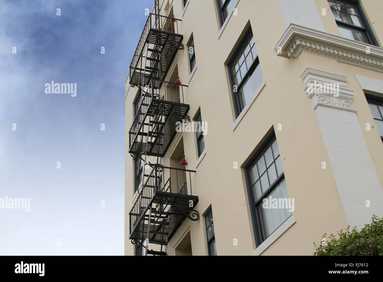 Fire Escape Stairs creating a pattern on a building Stock Photo - Alamy