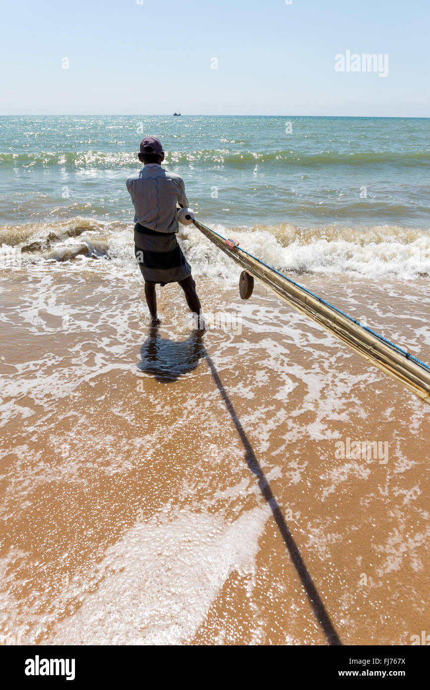 Fisherman pulling his net hi-res stock photography and images - Alamy