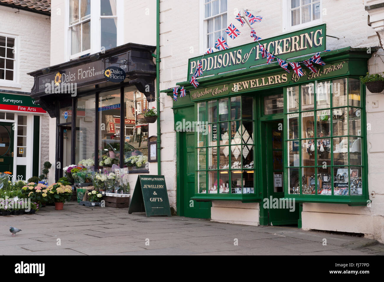 Attractive, quaint shop fronts (florist & jewellers) of local ...