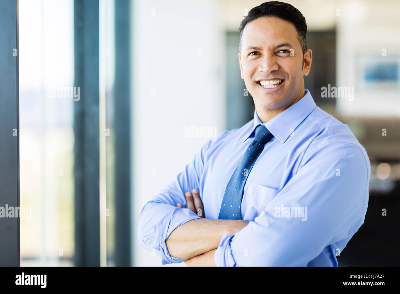 Middle aged worker smiling hi-res stock photography and images - Alamy