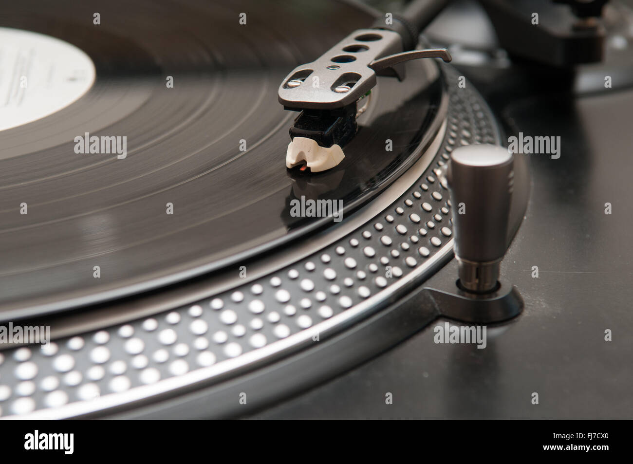 Old style vinyl record spinning on a turntable Stock Photo - Alamy