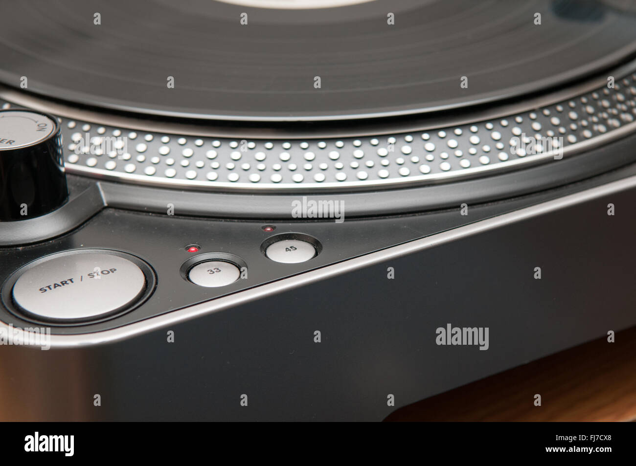 Old style vinyl record spinning on a turntable Stock Photo - Alamy