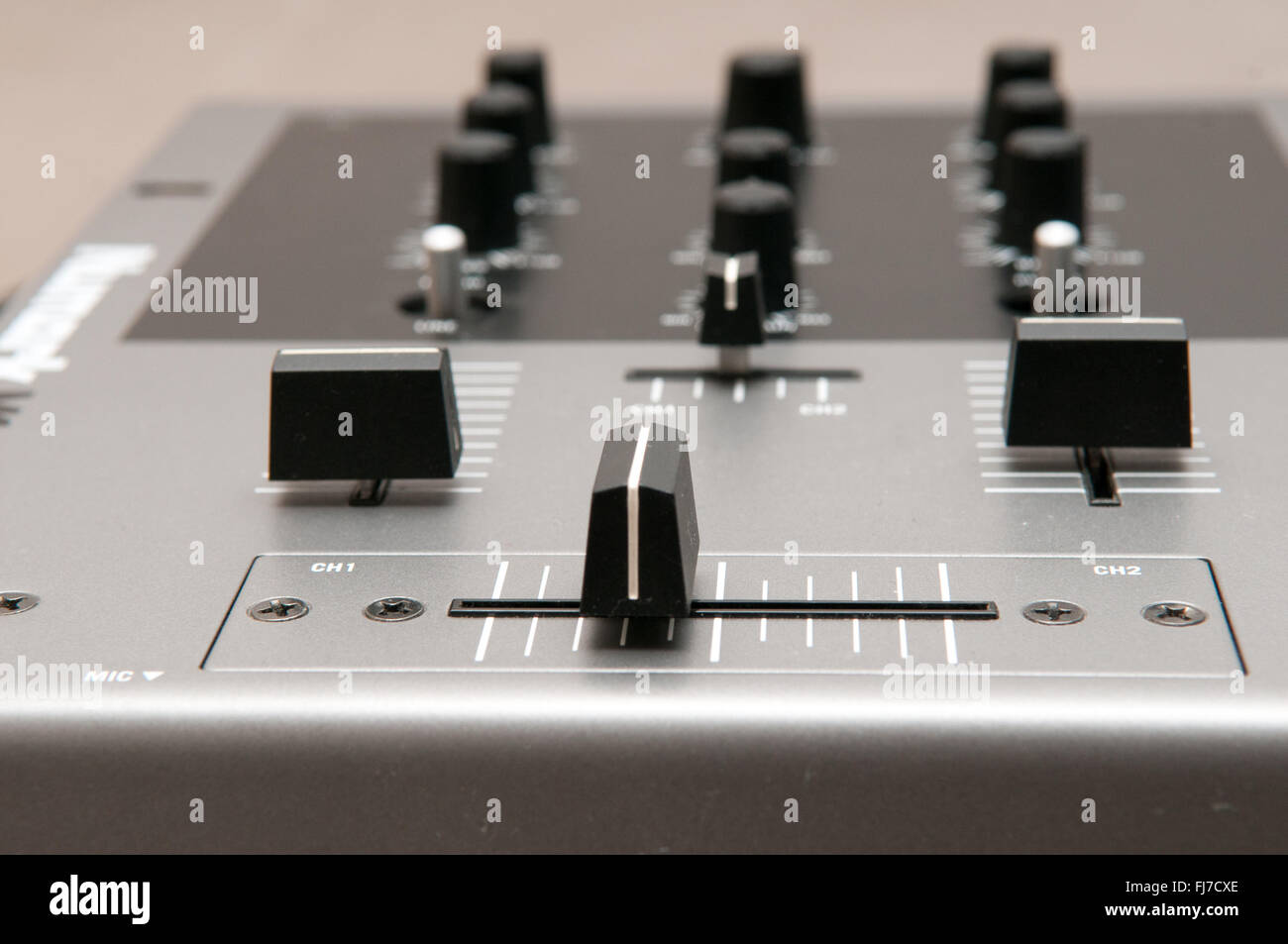 Close up of a dj's sound mixer for volume control Stock Photo - Alamy