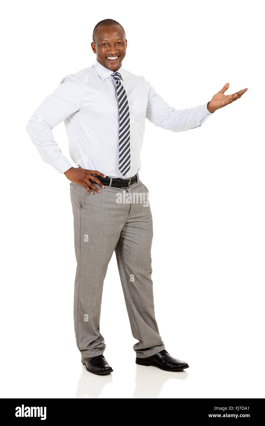 happy African businessman doing welcome gesture on white background ...