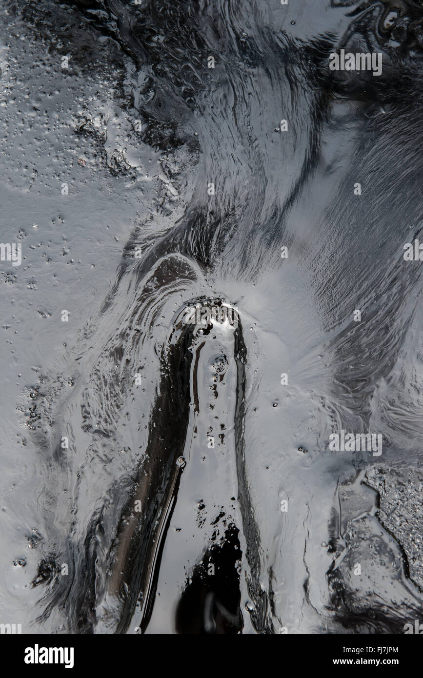 crude oil surface background textured Stock Photo - Alamy