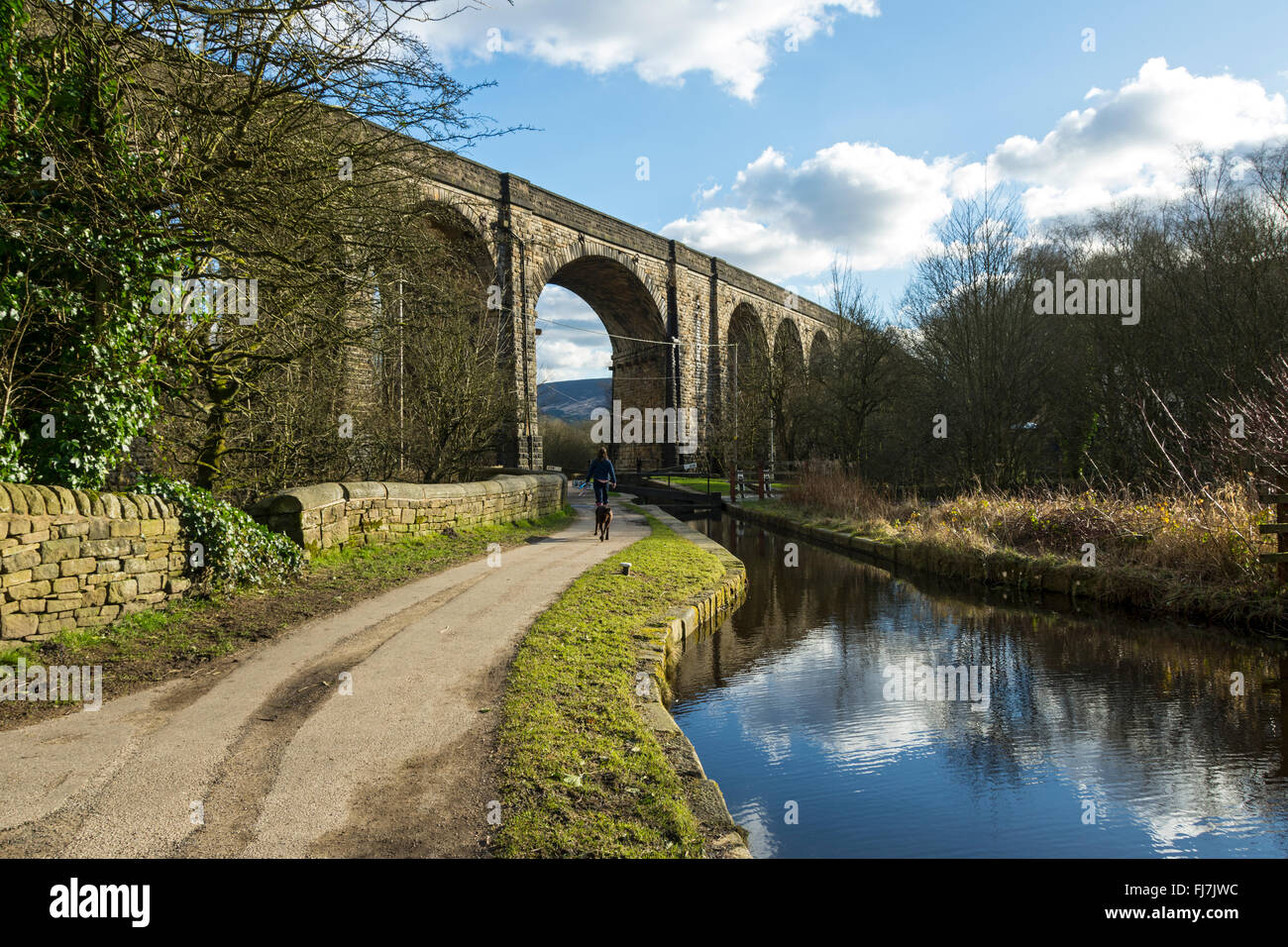 Railway viaduct and the Saddleworth Aqueduct on the Huddersfield Canal ...