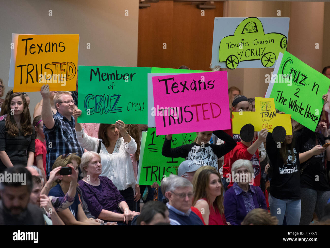 Supporters hold signs as Republican presidential nominee candidate Ted ...