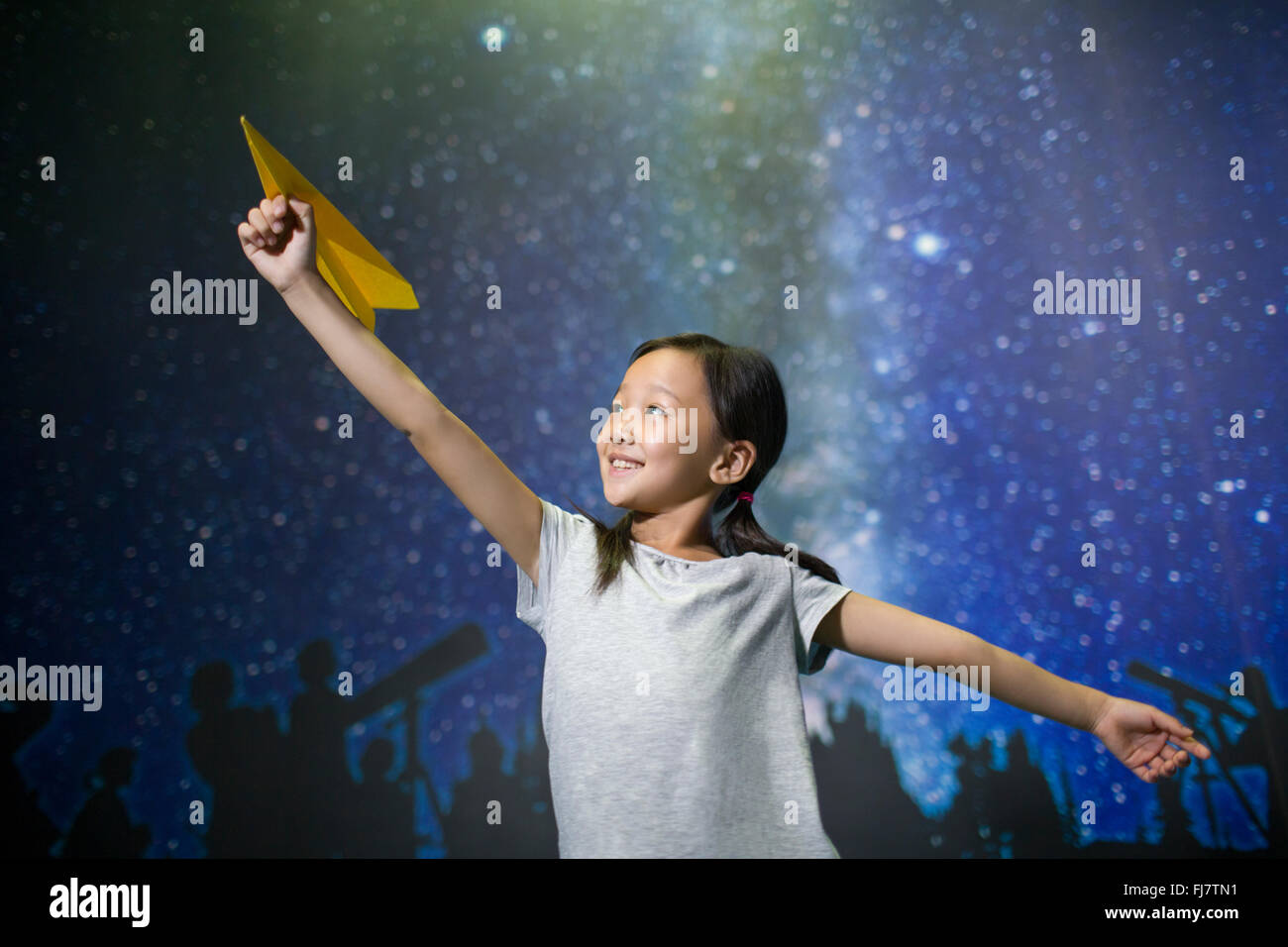 Little Chinese girl in science and technology museum Stock Photo - Alamy