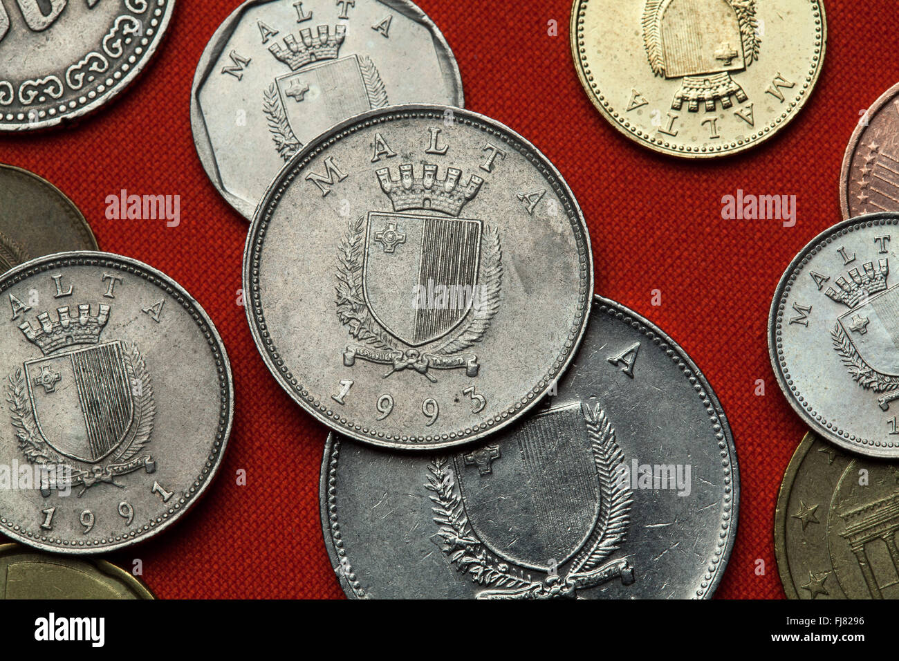 Coins of Malta. Coat of arms of Malta depicted in the Maltese lira ...