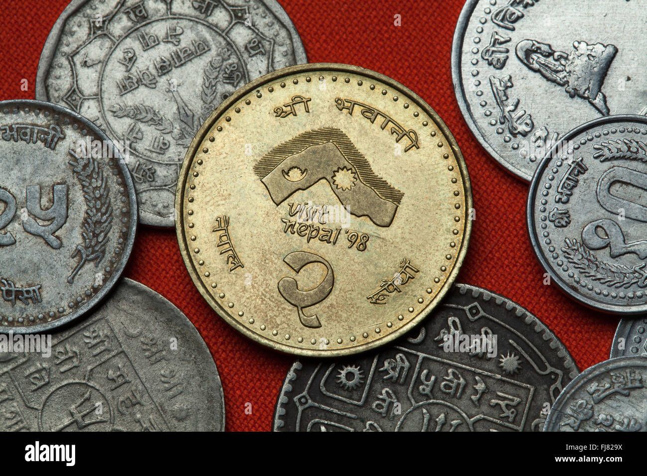 Coins of Nepal. Nepalese commemorative two rupee coin dedicated to the ...