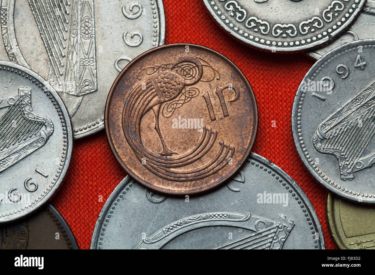 Coins of Ireland. Celtic ornamental bird depicted in the Irish one ...