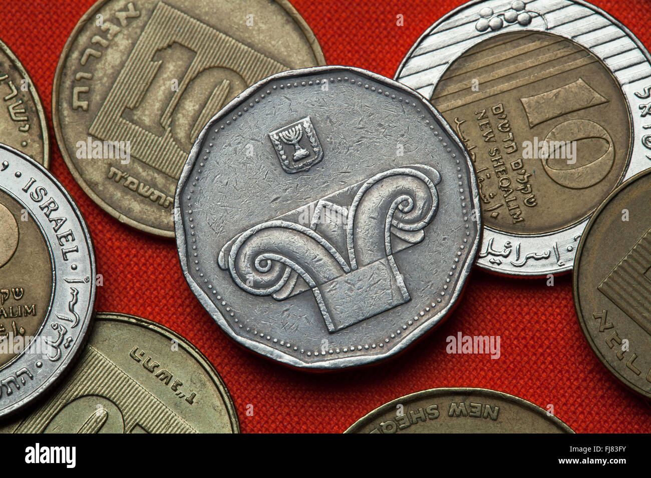 Coins of Israel. Ionic capital of column depicted in the Israeli five ...