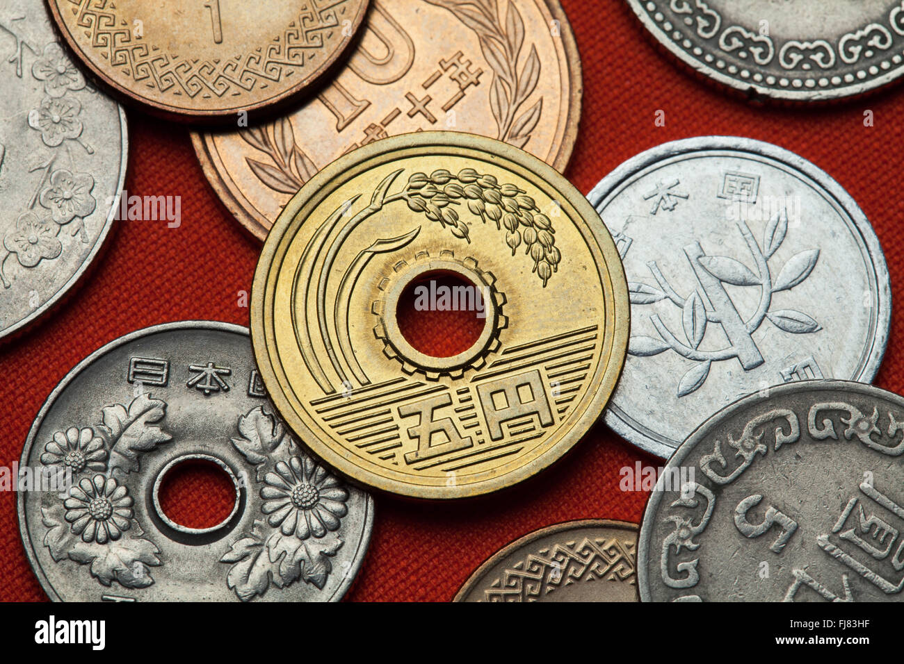 Coins of Japan. Ear of rice depicted in the Japanese five yen coin ...