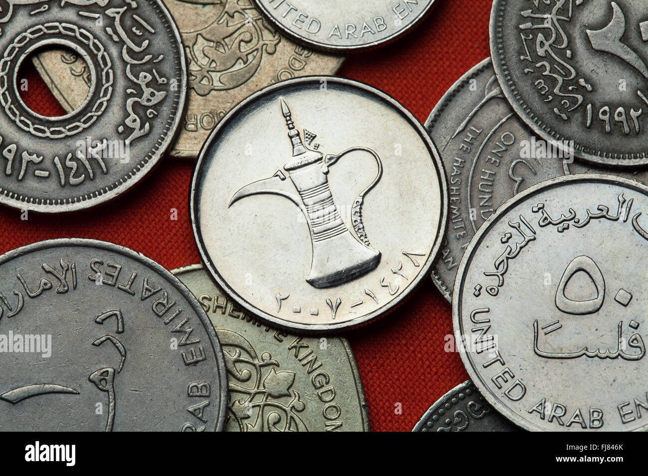 Coins of the United Arab Emirates. Arab tea pot depicted in the UAE one ...