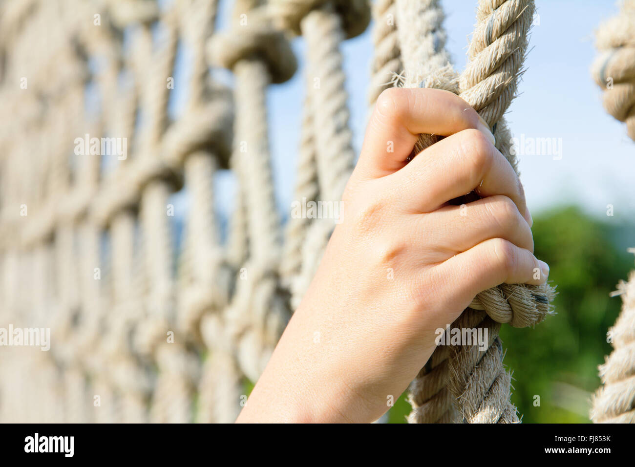 Close up image of hand holding climbing ropes Stock Photo - Alamy