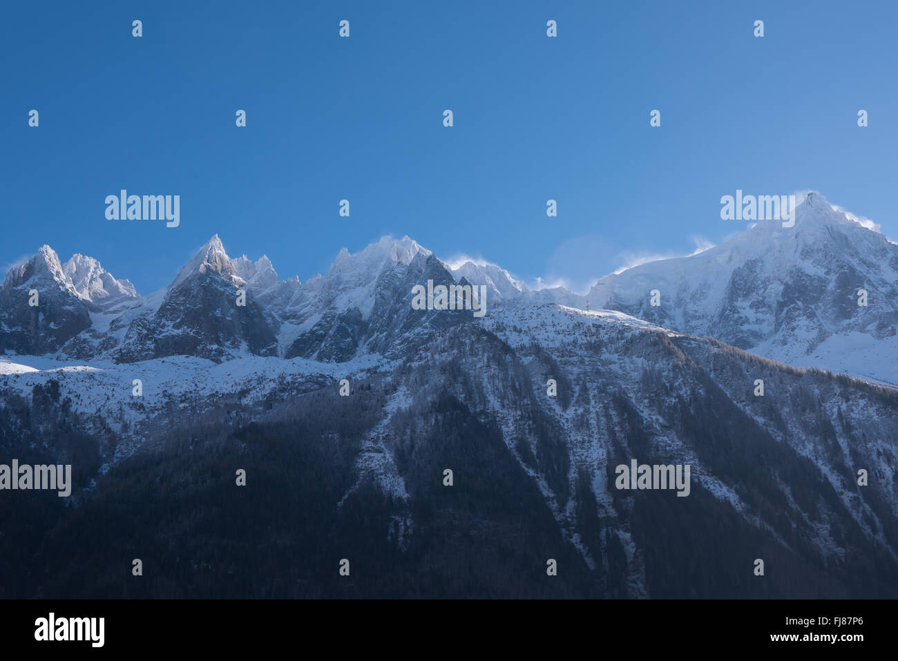 French alps mountain peaks covered with fresh snow. Winter landscape ...