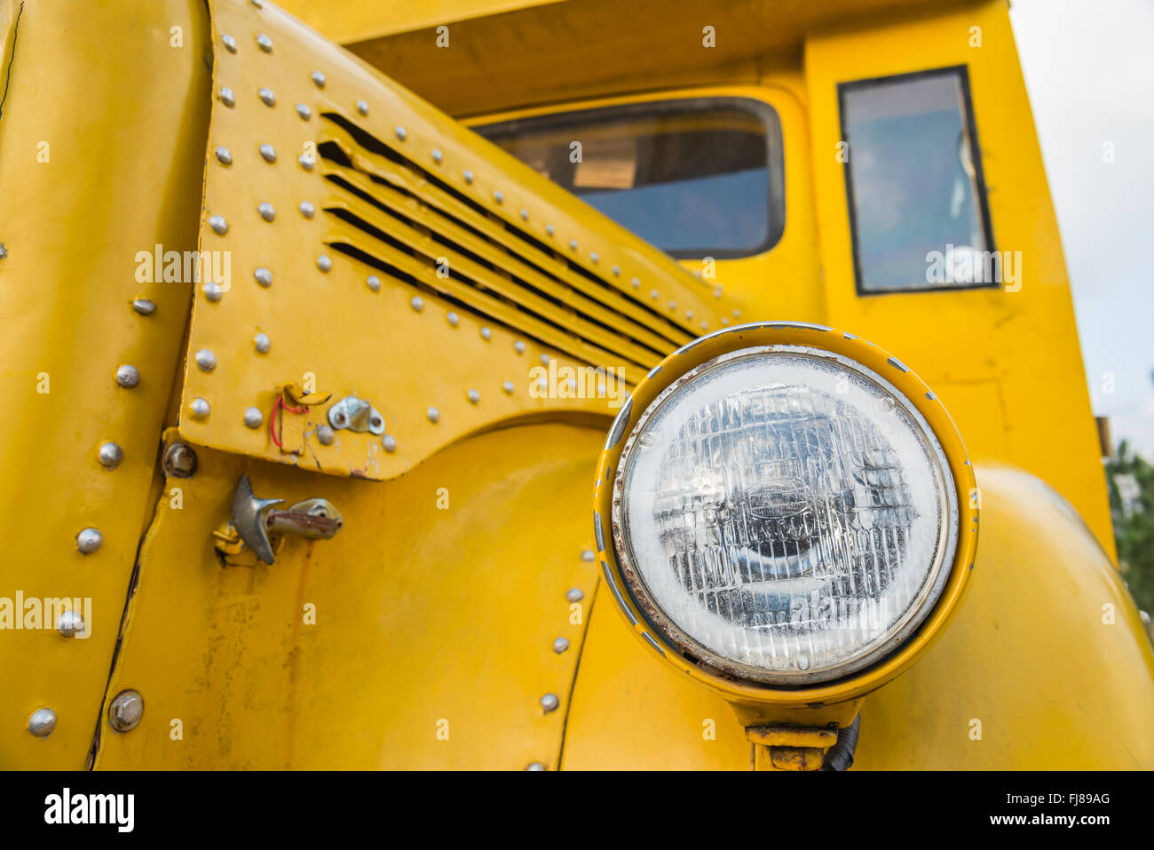 Front lamp of yellow school bus 2 Stock Photo - Alamy